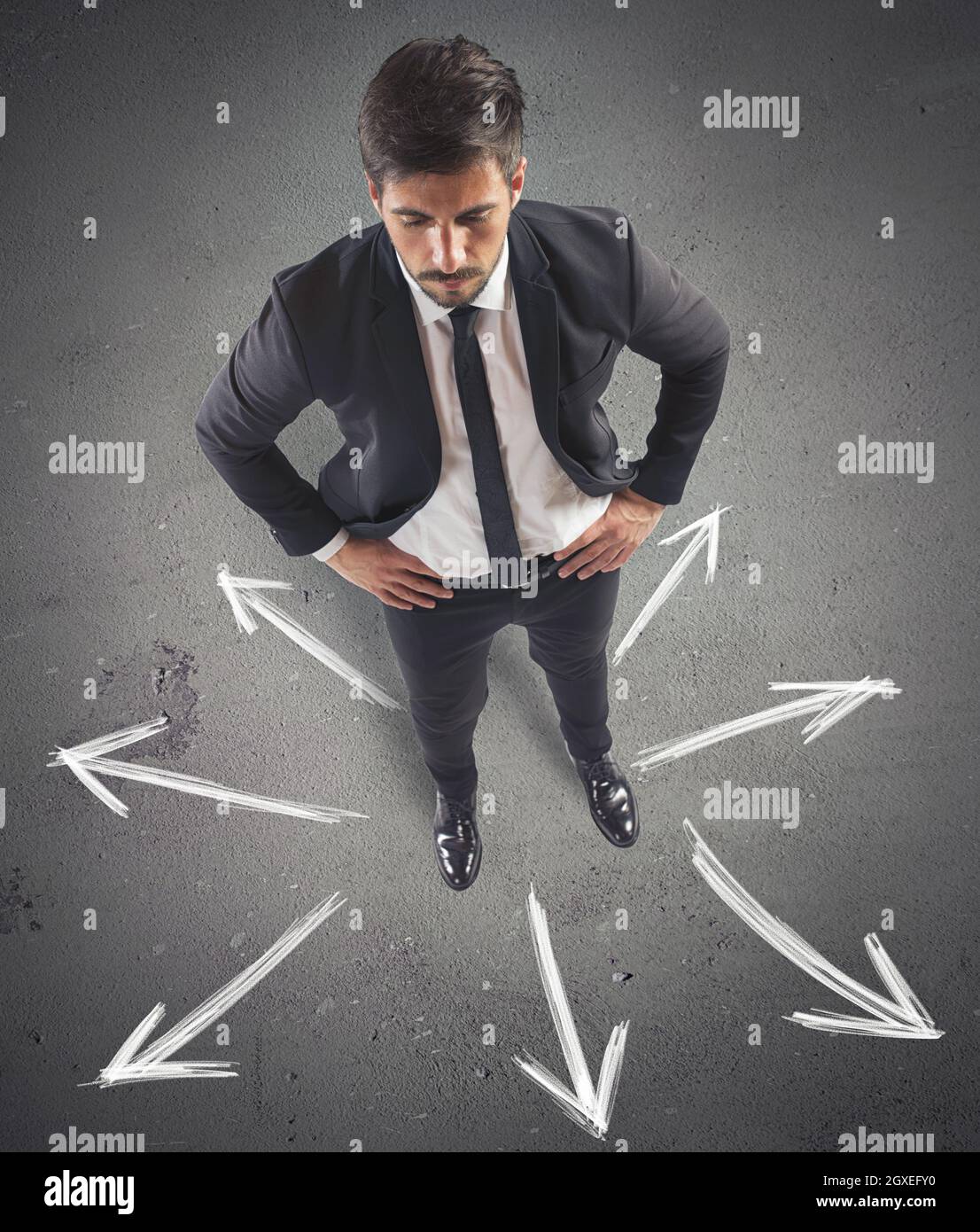 Businessman with different directions you can take Stock Photo - Alamy