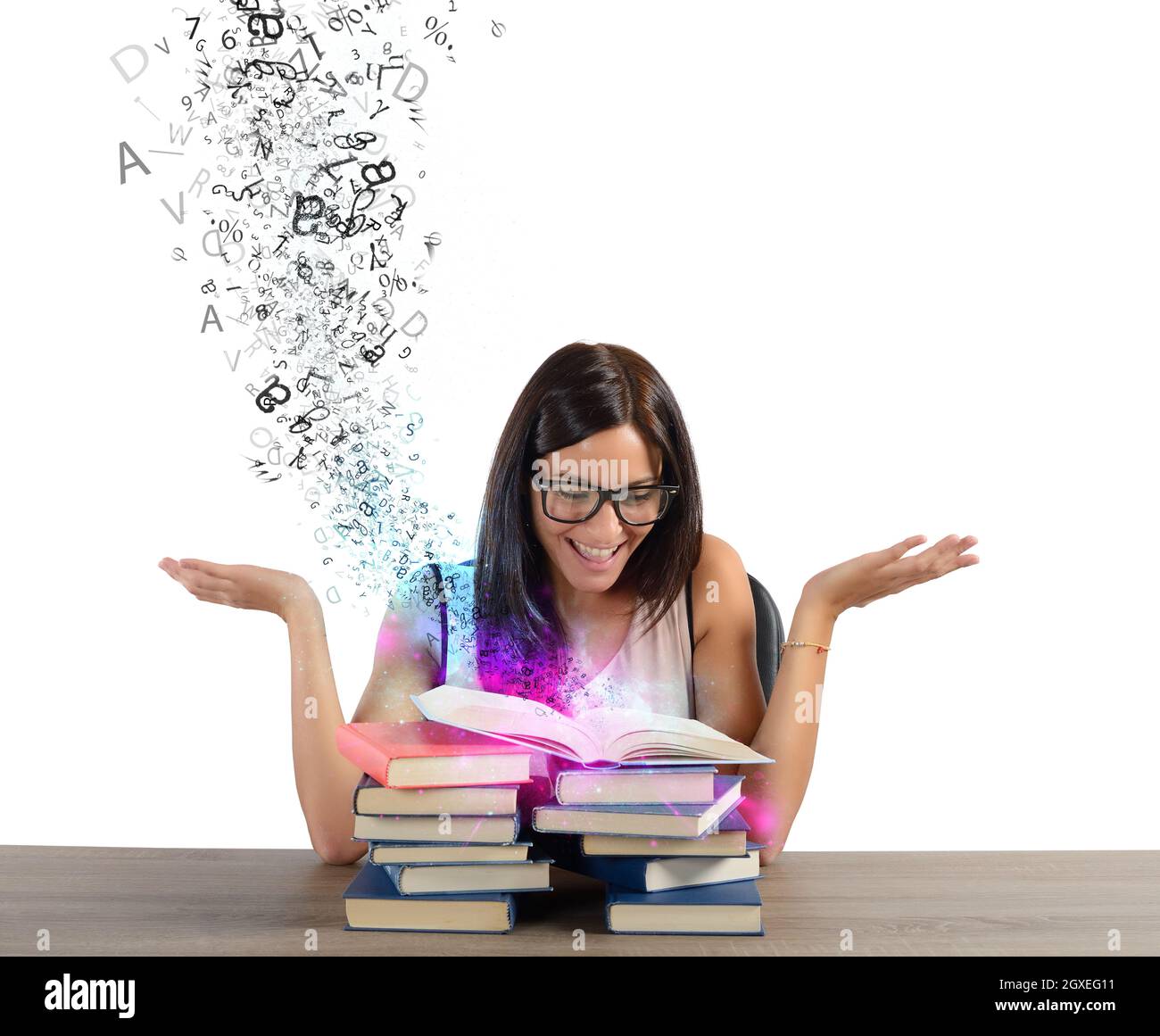 Woman draws inspiration from books like magic Stock Photo - Alamy
