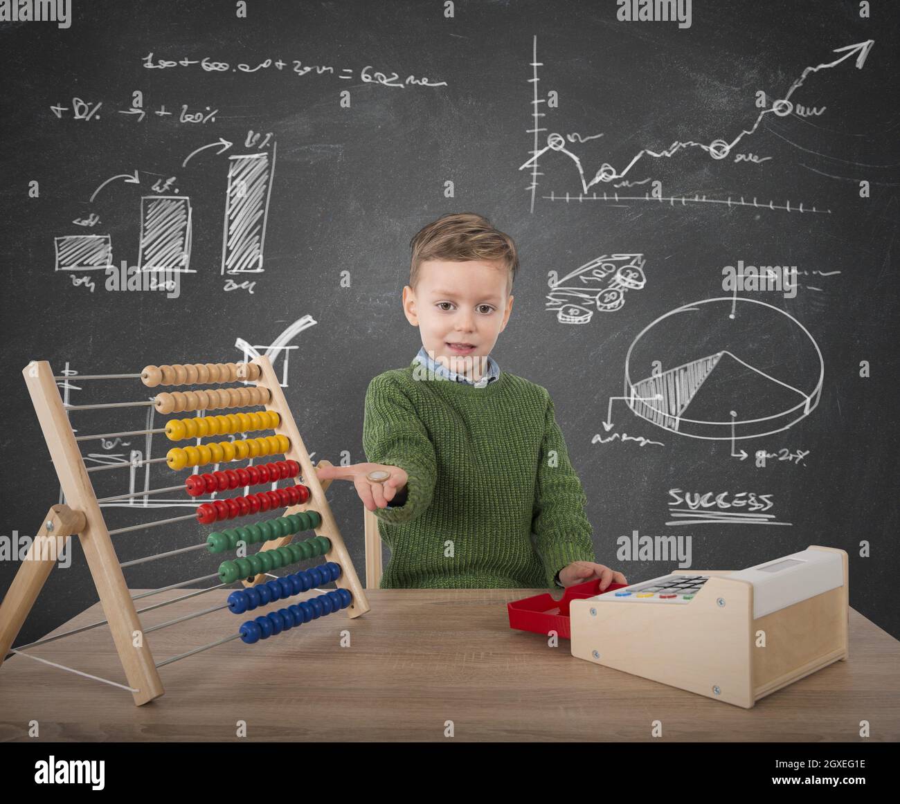 Child plays to make calculations with money Stock Photo - Alamy