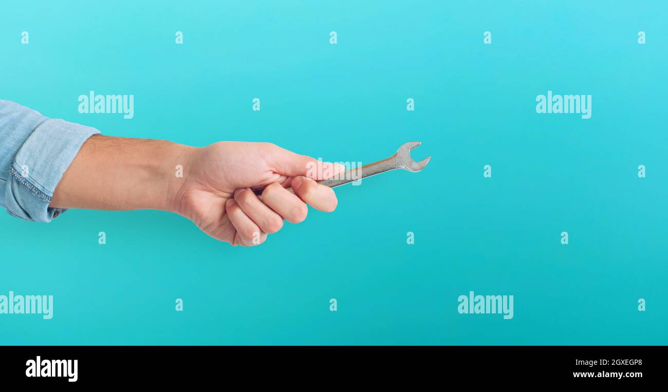 Man with spanners ready to fix something Stock Photo - Alamy