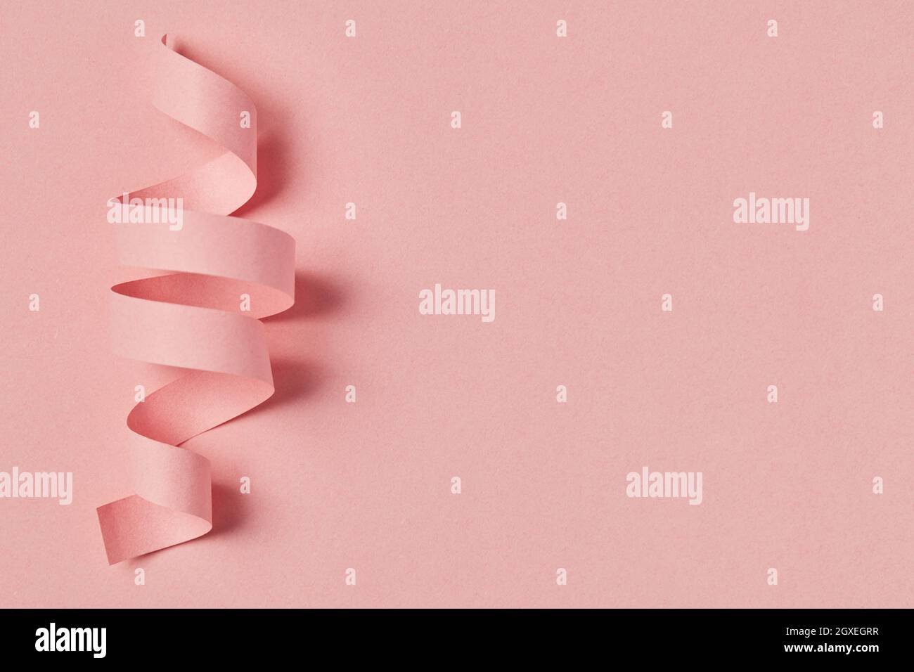 Pink paper ribbon Stock Photo - Alamy