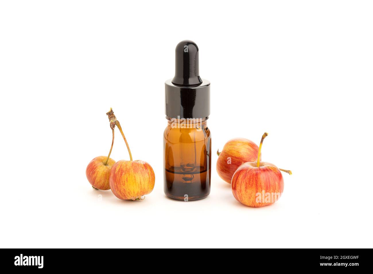 Apple essential oil isolated on white background. Apple oil Stock Photo ...