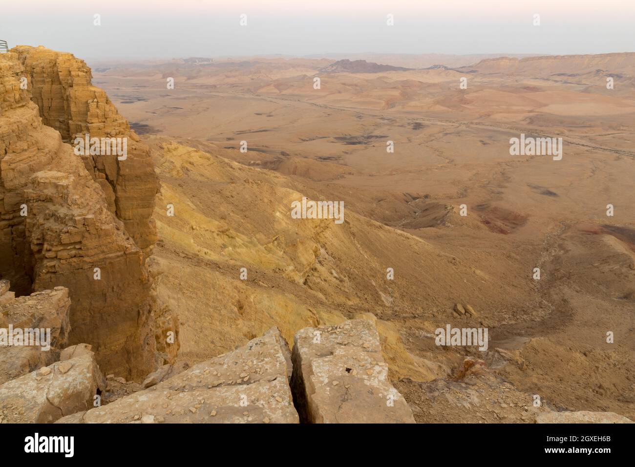 Sunset view of the edge of Makhtesh (crater) Ramon, in the Negev Desert ...