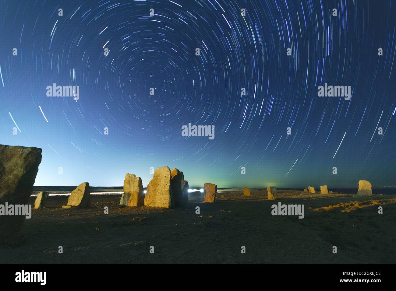 View of rocks and star trails in the Negev Desert, Southern Israel ...