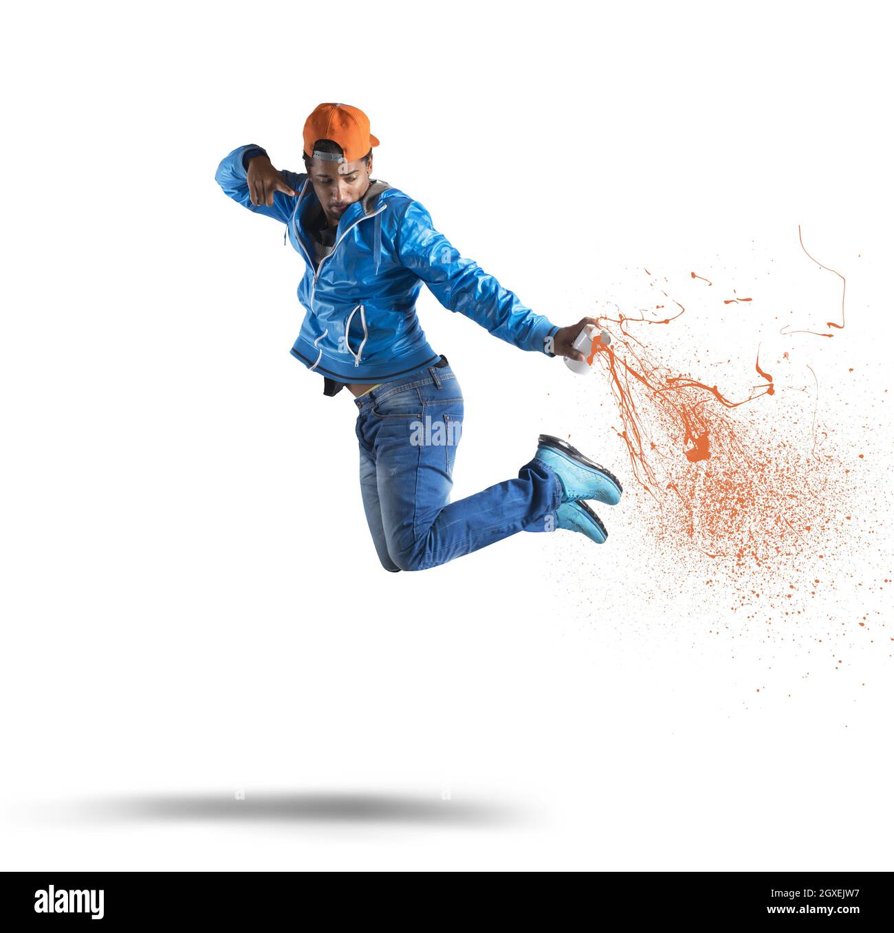 Boy jumps and color with the spray Stock Photo - Alamy