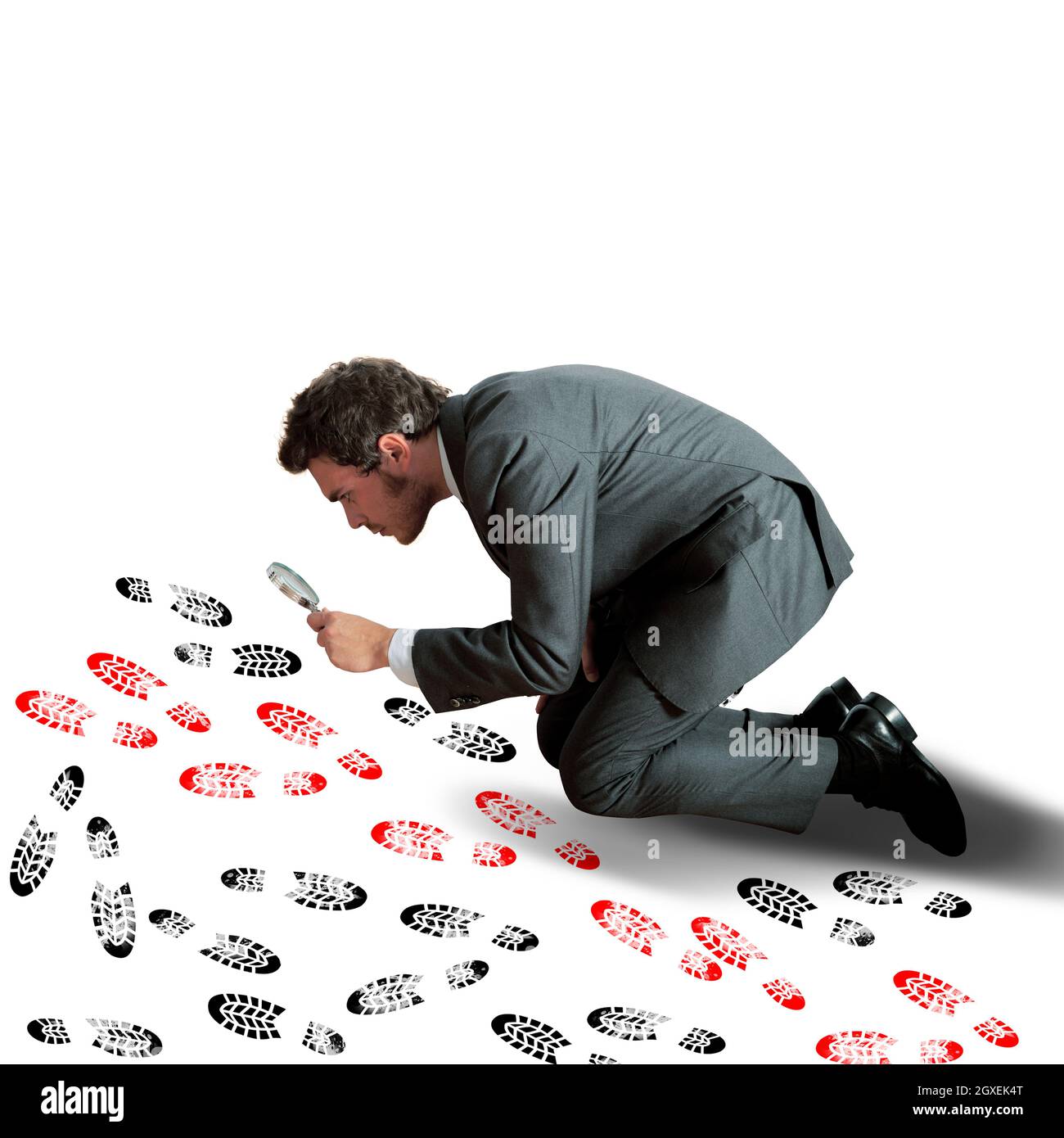 Man investigates and tries the different footprints Stock Photo - Alamy
