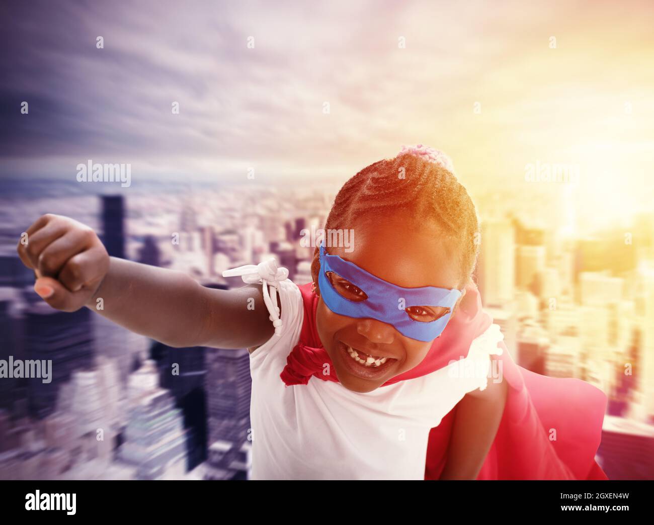 Child acts like a brave superhero to save the world Stock Photo - Alamy