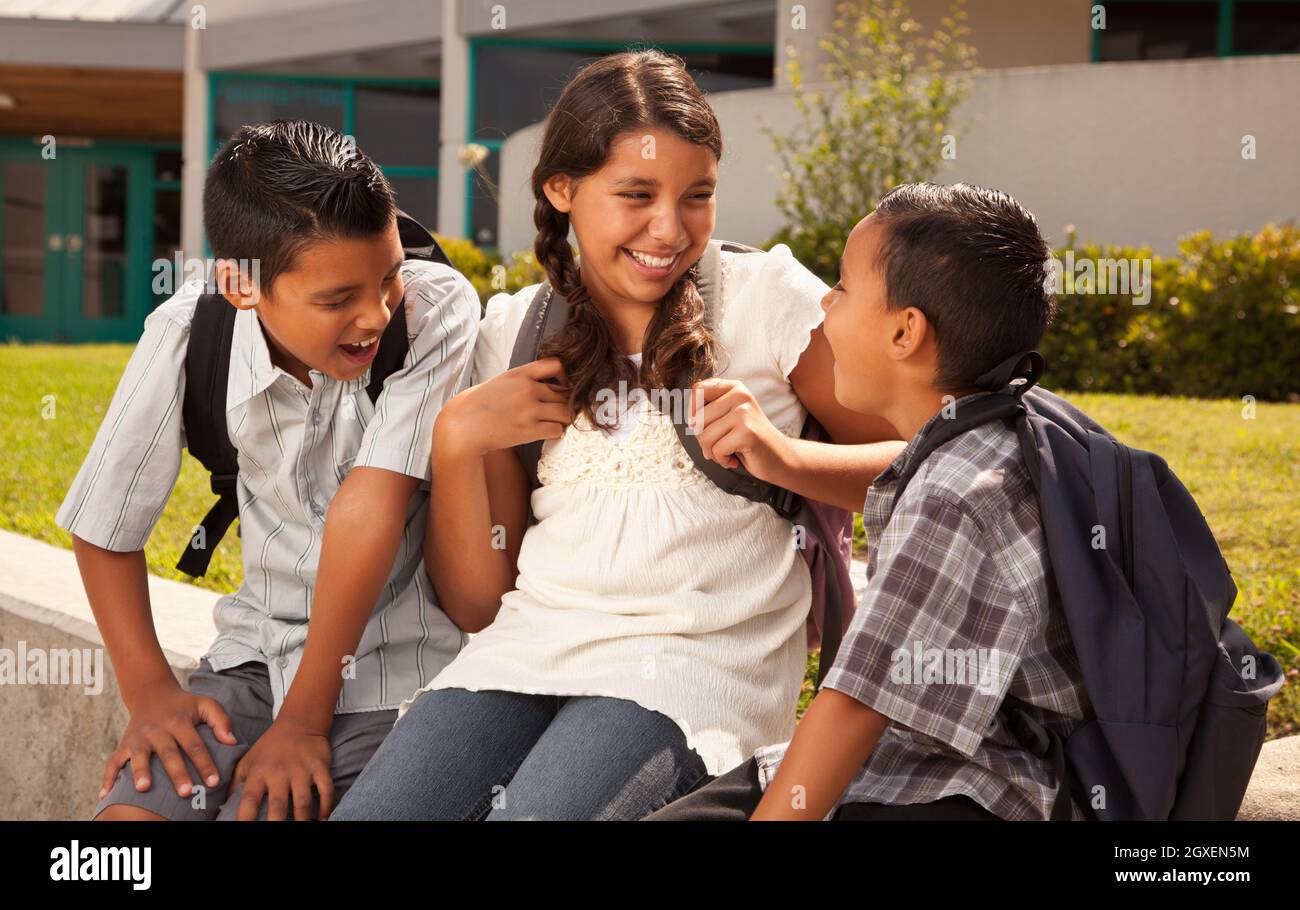 Cute Hispanic Brothers and Sister Talking Ready for School on Morning ...