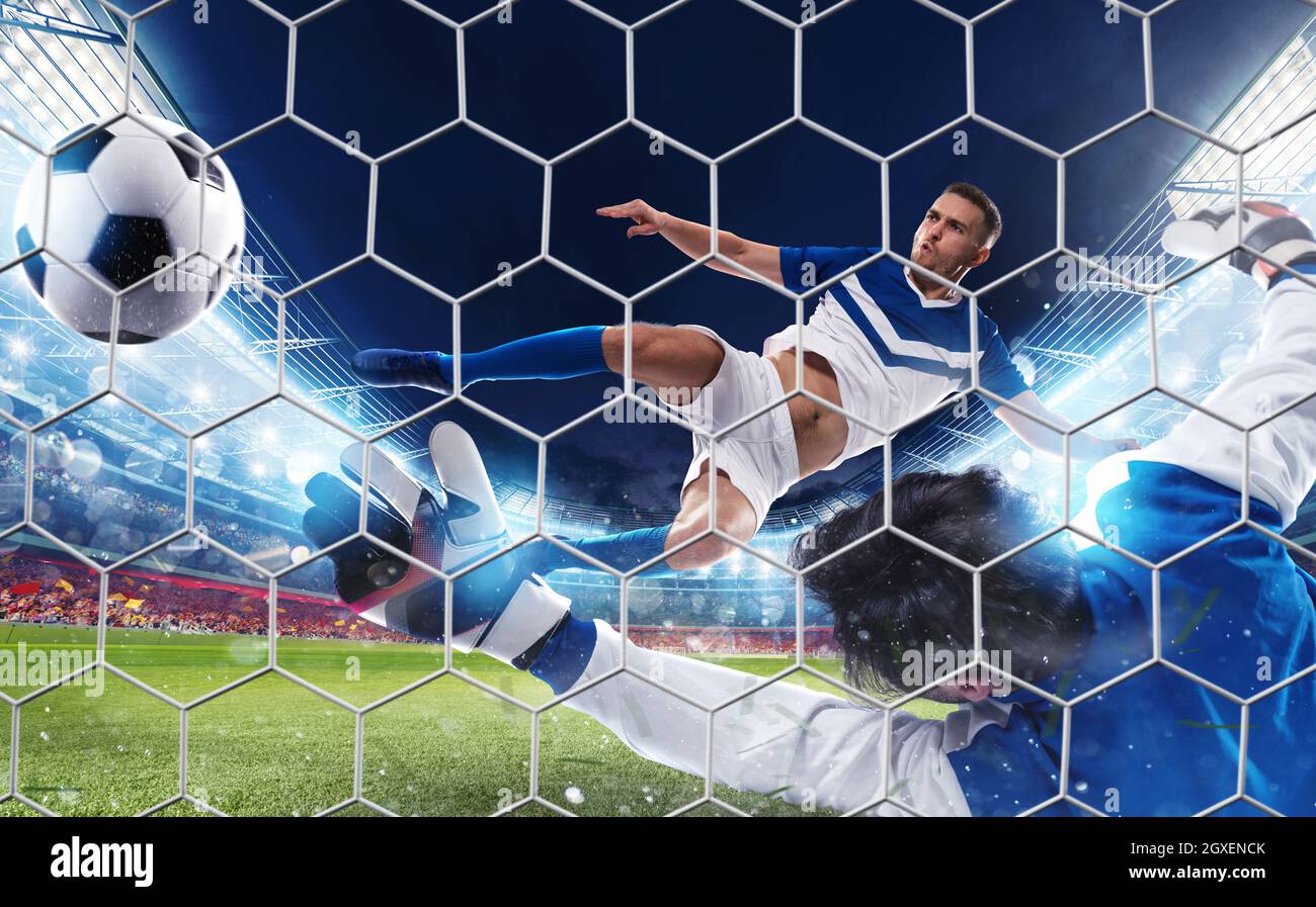 Soccer striker hits the ball with an acrobatic jumping kick Stock Photo ...