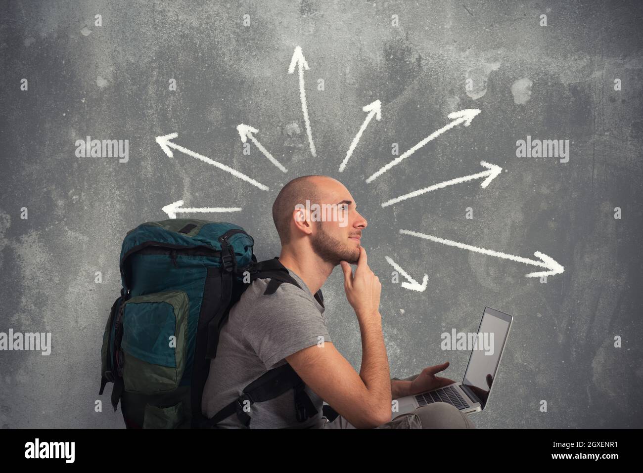 Explorer man plans a new travel with his laptop Stock Photo - Alamy