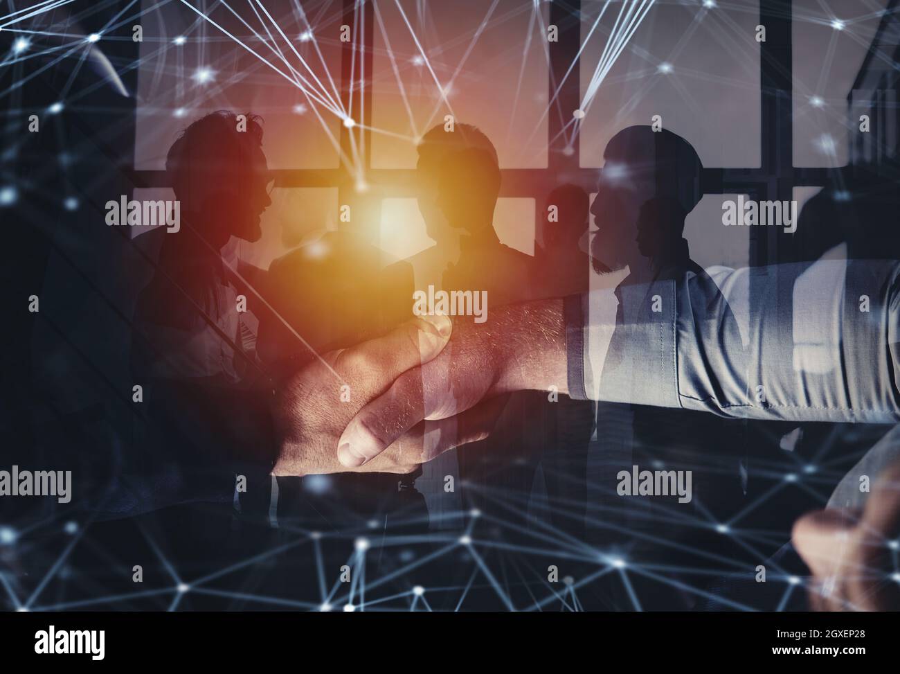 Handshaking business person in the office with network effect. concept ...