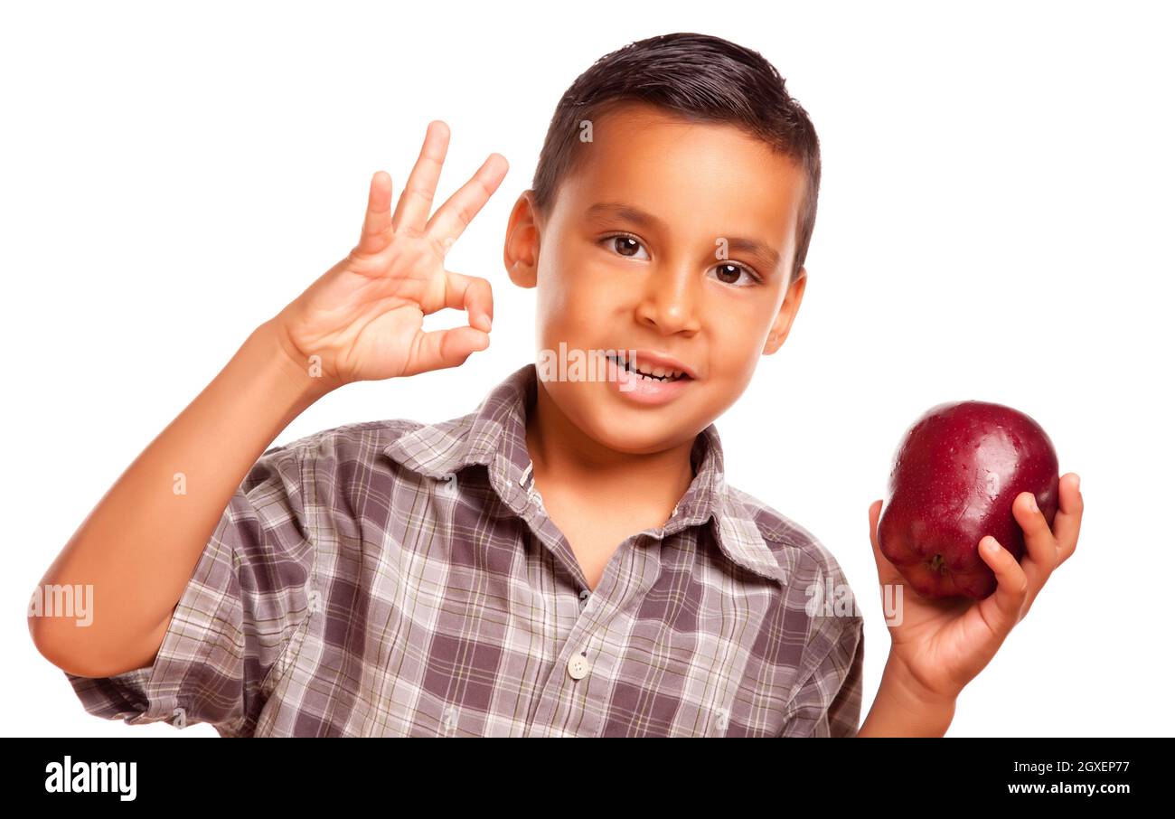Adorable Hispanic Boy with Apple and Okay Hand Sign Isolated on a White ...