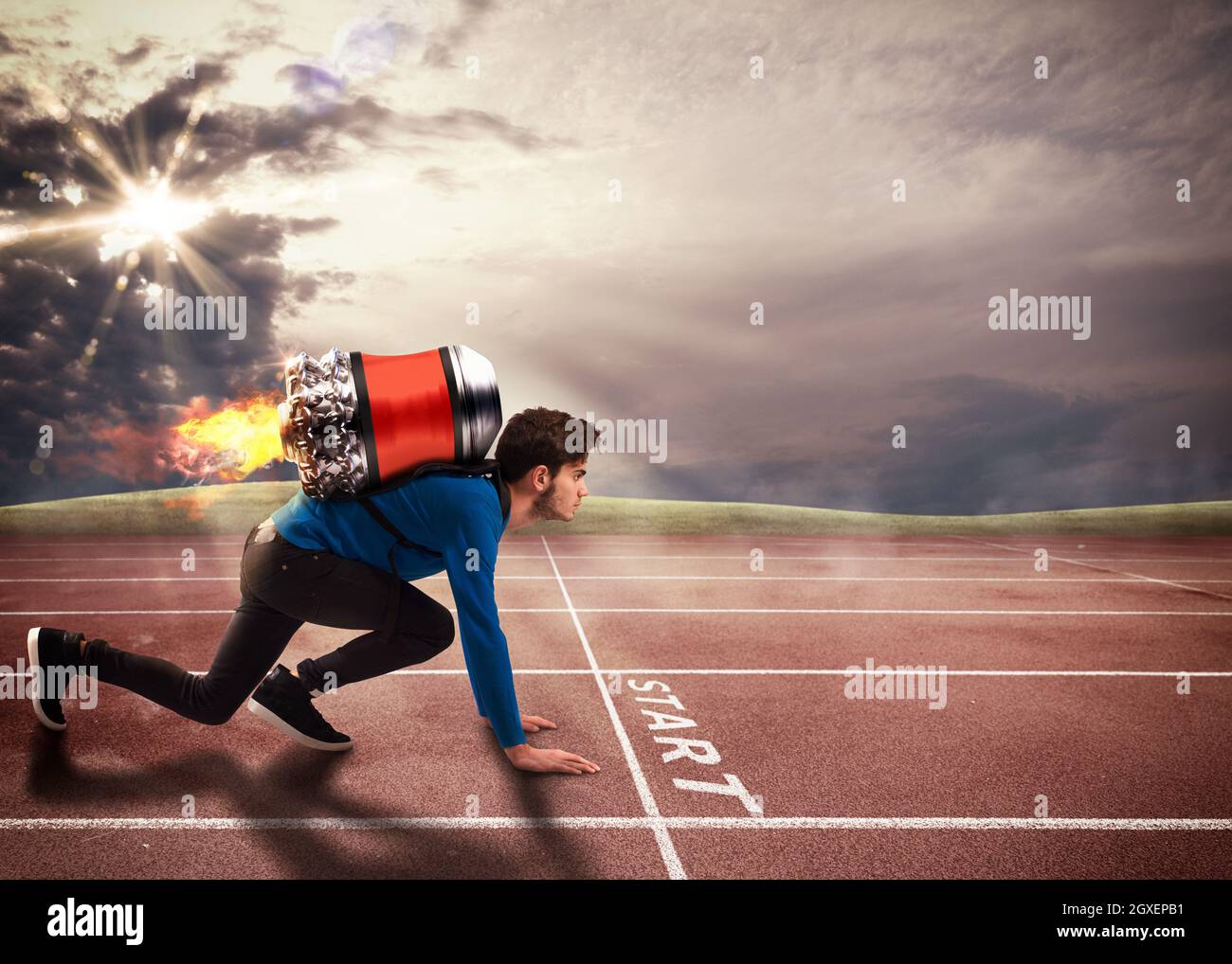 Boy with rocket on his back on running track Stock Photo - Alamy
