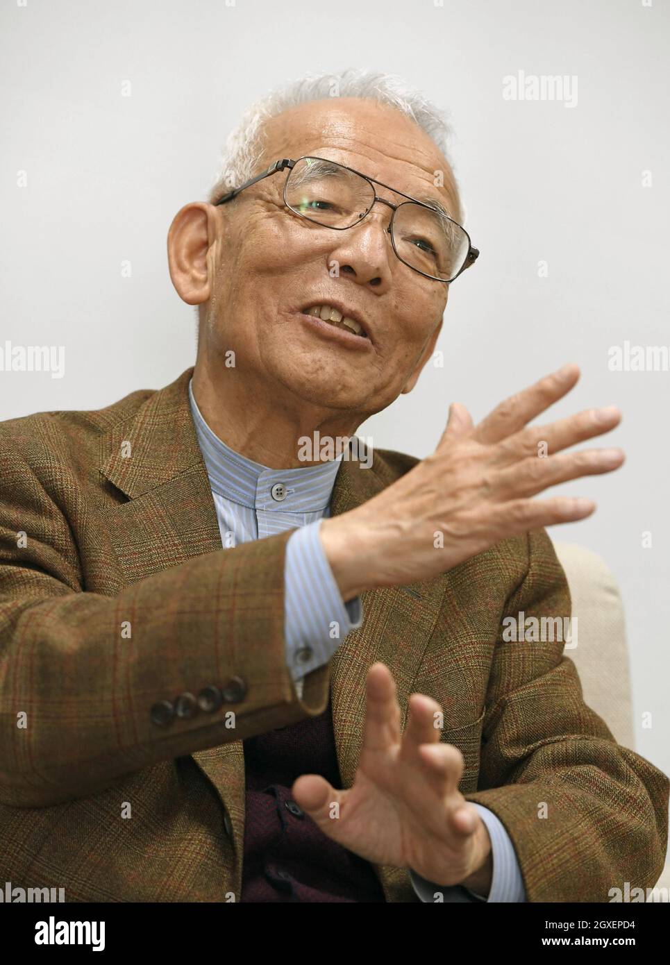 File photo taken in Oct. 31, 2017, shows Syukuro Manabe giving an ...