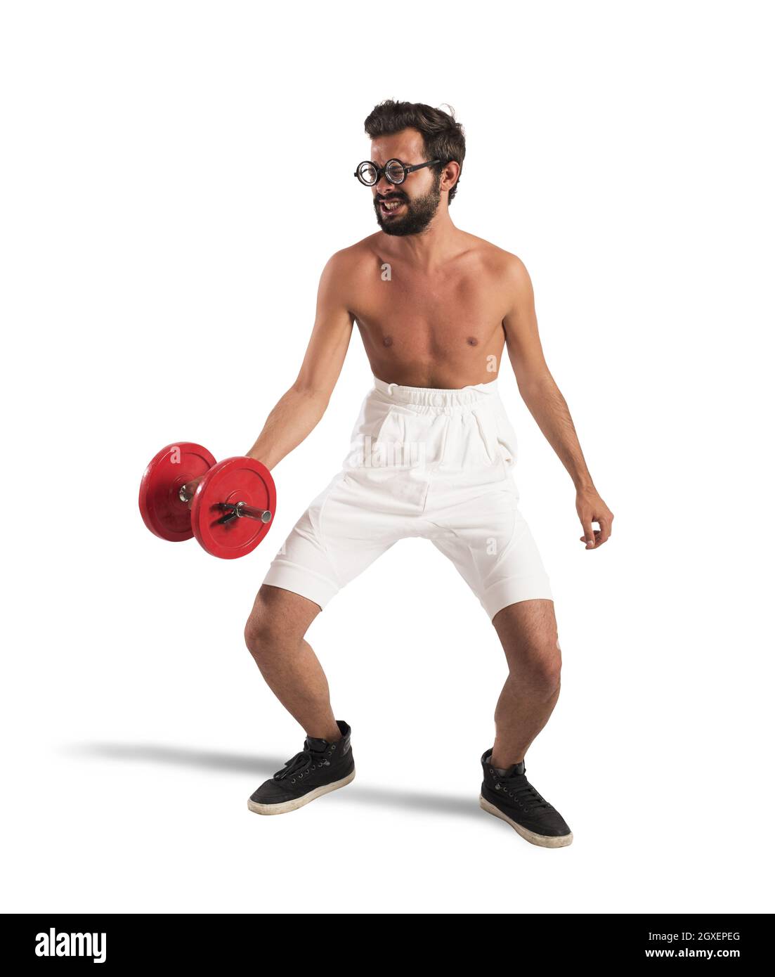 Nerdy guy and awkward lifts of weights Stock Photo - Alamy