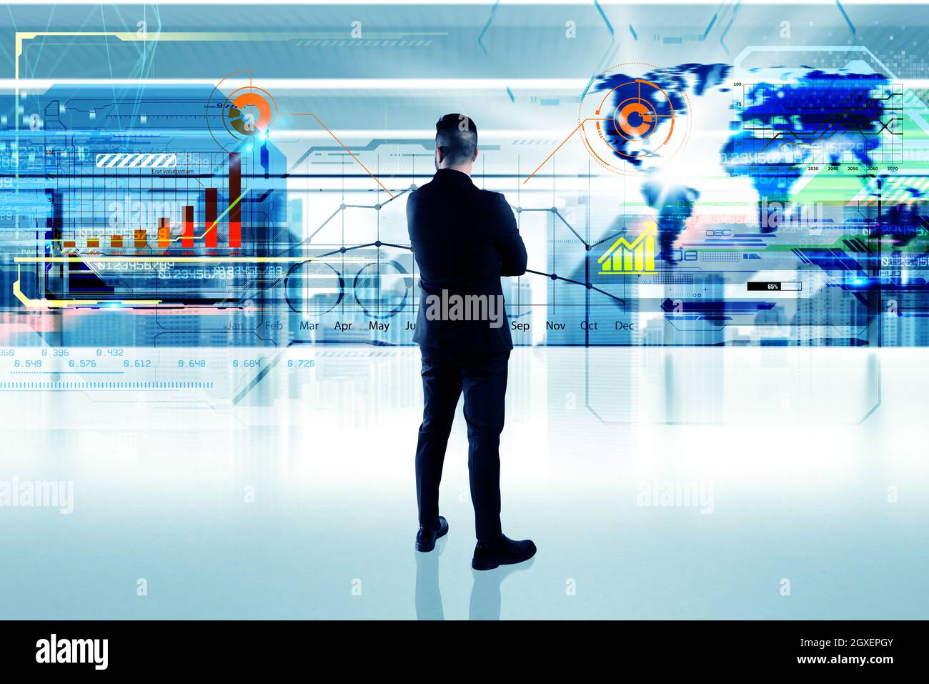 Business man in office looks futuristic interface Stock Photo - Alamy