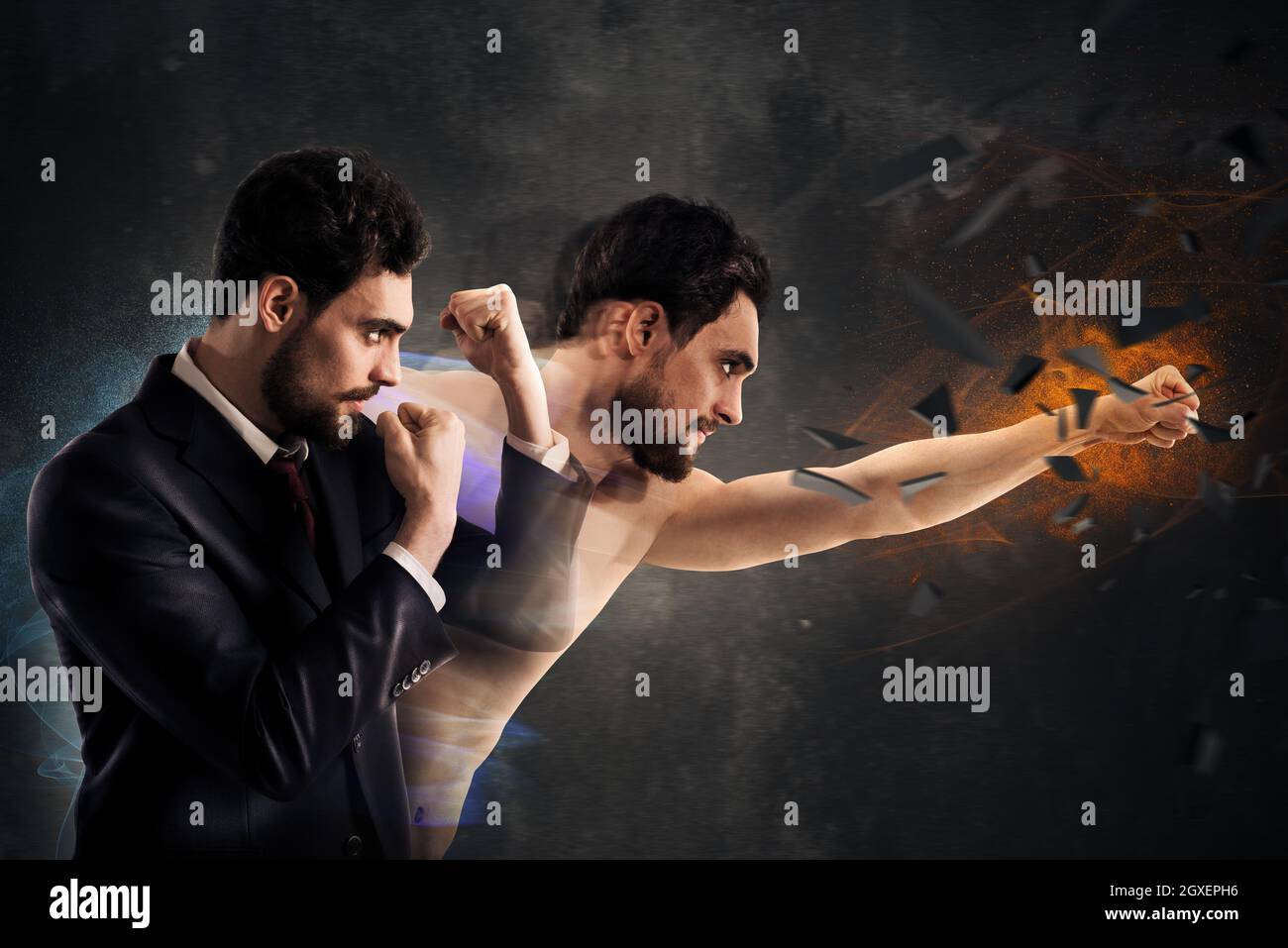 Business man punch with power and determination Stock Photo - Alamy