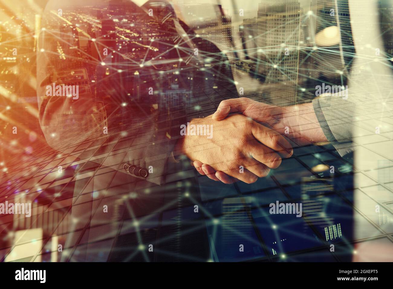 Handshaking business person in the office with network effect. concept ...