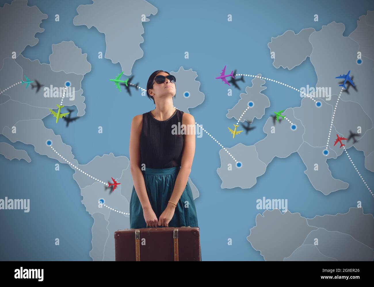 Globetrotting woman looking for a new destination Stock Photo - Alamy