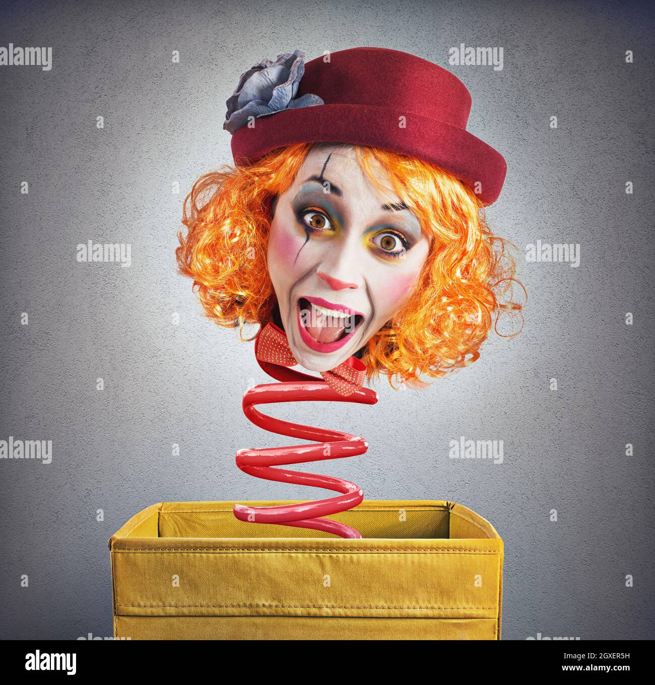 Strange funny magic box clown with spring Stock Photo - Alamy