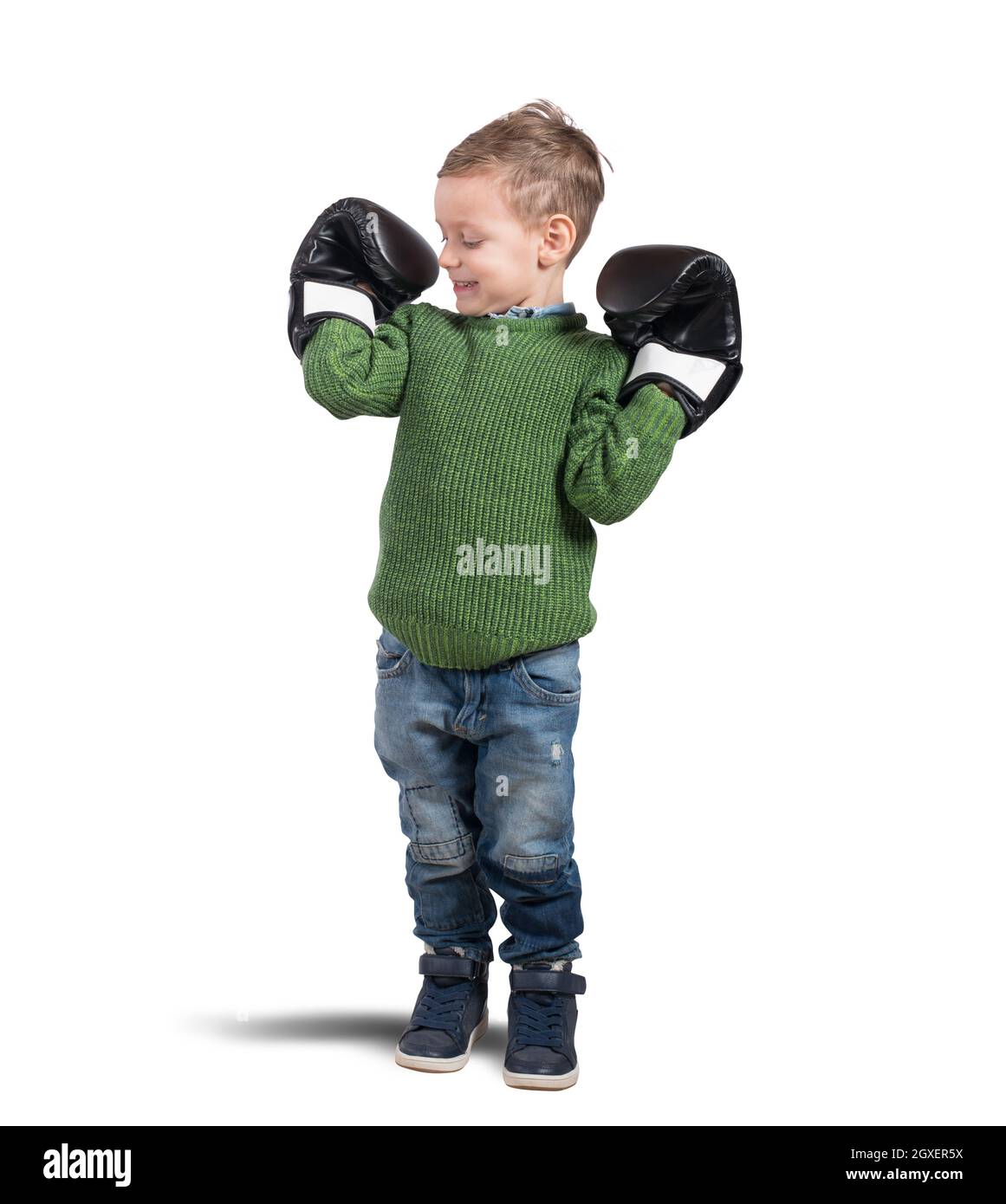 Proud young boy admires his small muscles Stock Photo - Alamy