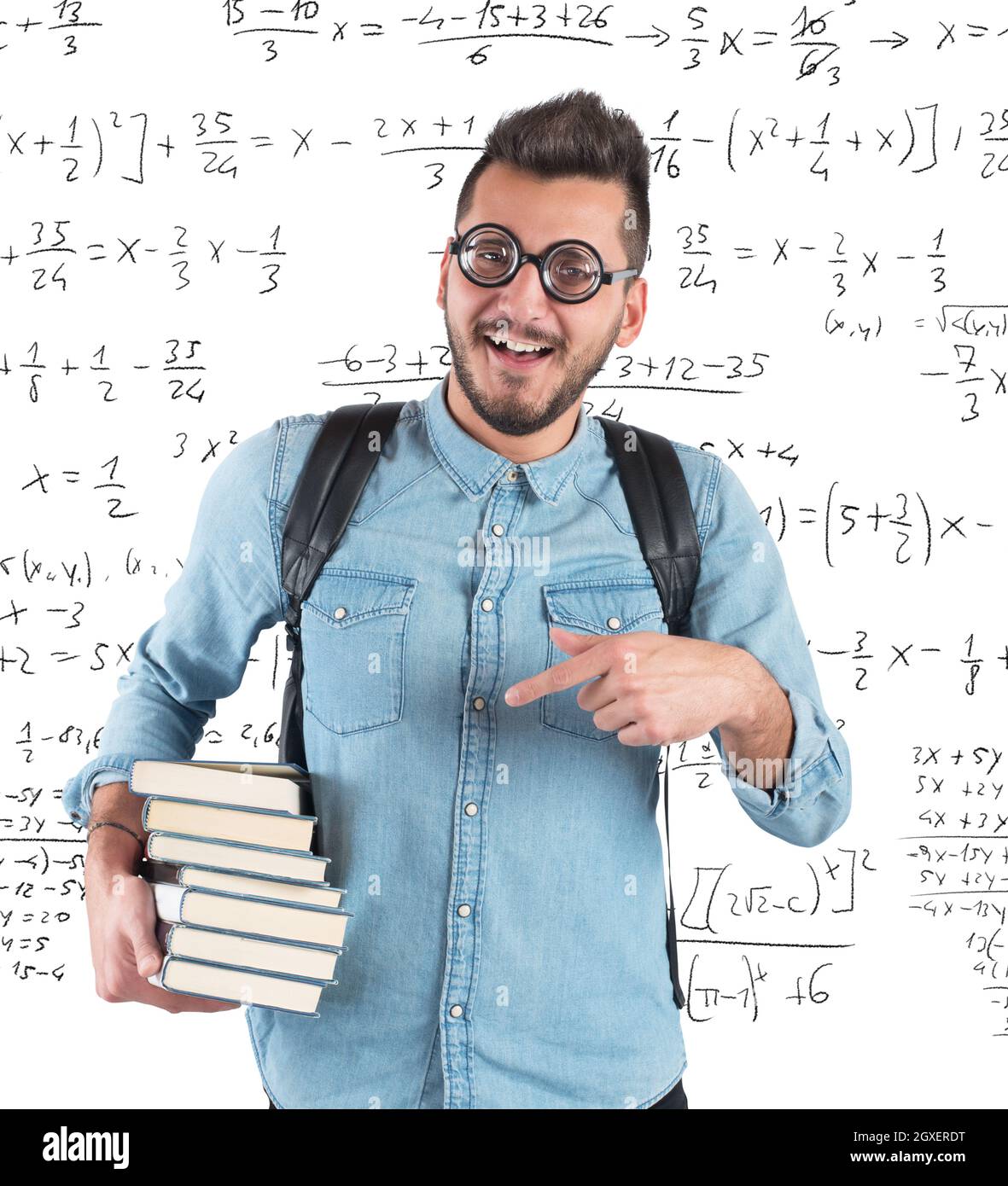 Nerd boy studying in classroom for math Stock Photo - Alamy