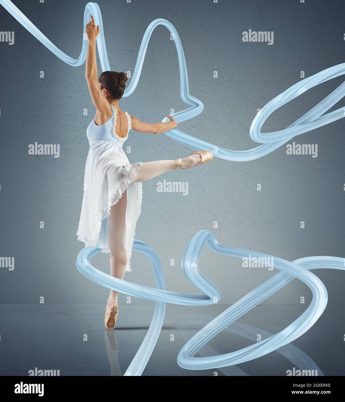 Elegant woman classical dancer dancing on tiptoe Stock Photo - Alamy