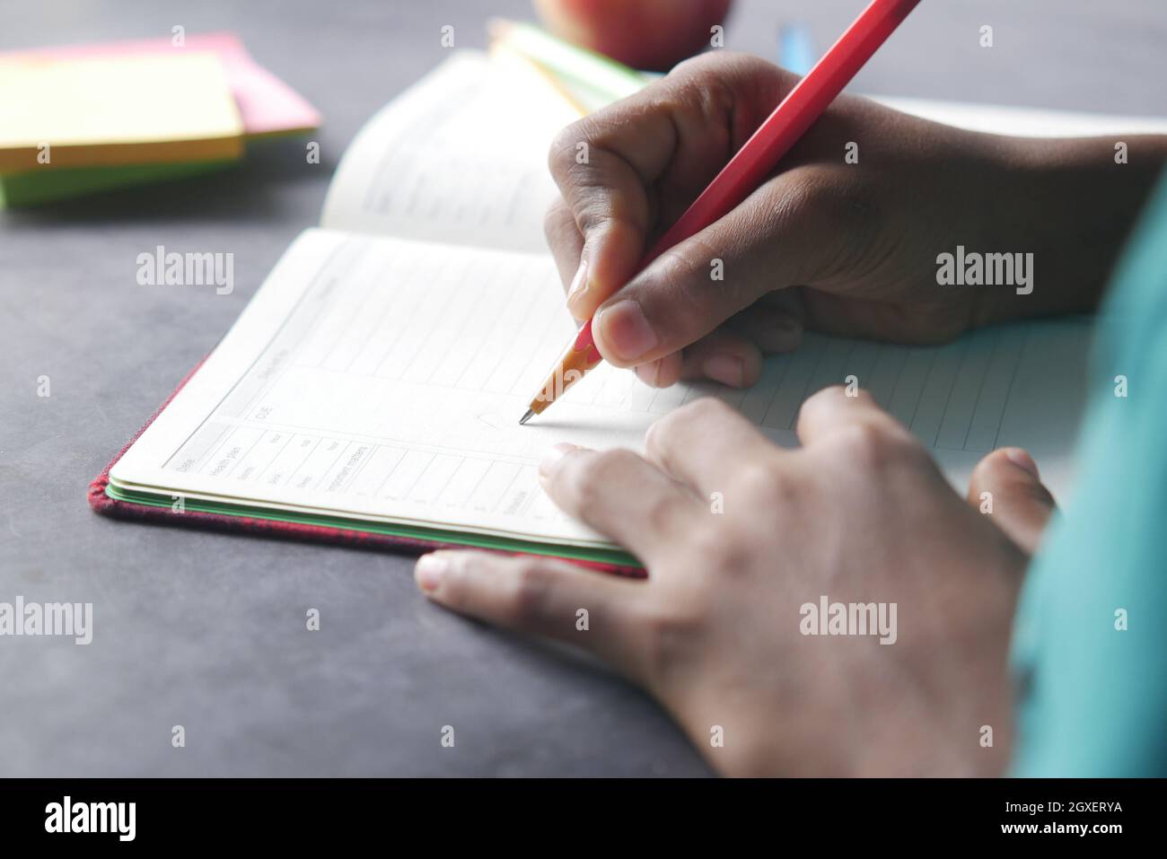 Boy writing diary hi-res stock photography and images - Alamy