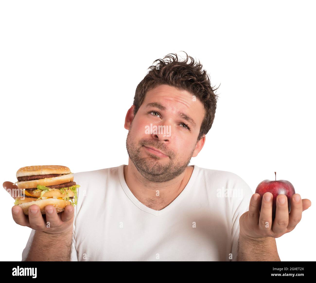 Man choosing between healthy food and unhealthy Stock Photo - Alamy