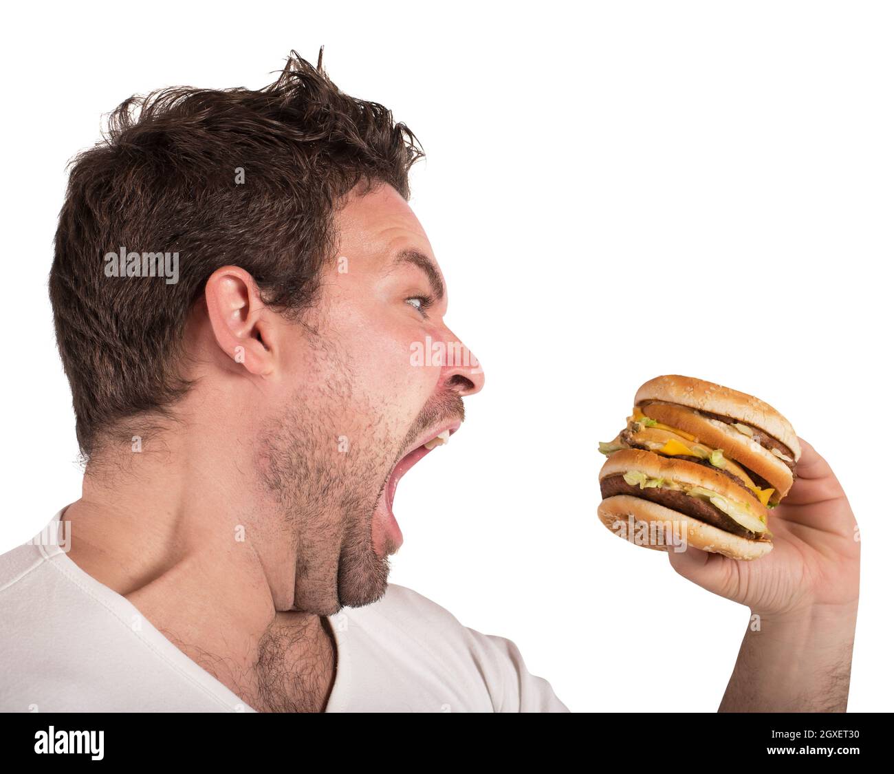 Insatiable and hungry man eating a sandwich Stock Photo - Alamy