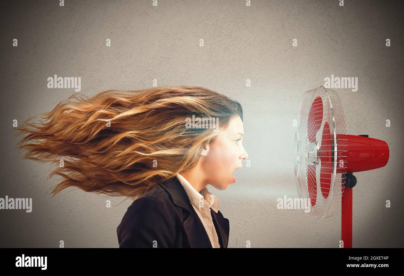 The air fan moves the woman hair Stock Photo - Alamy