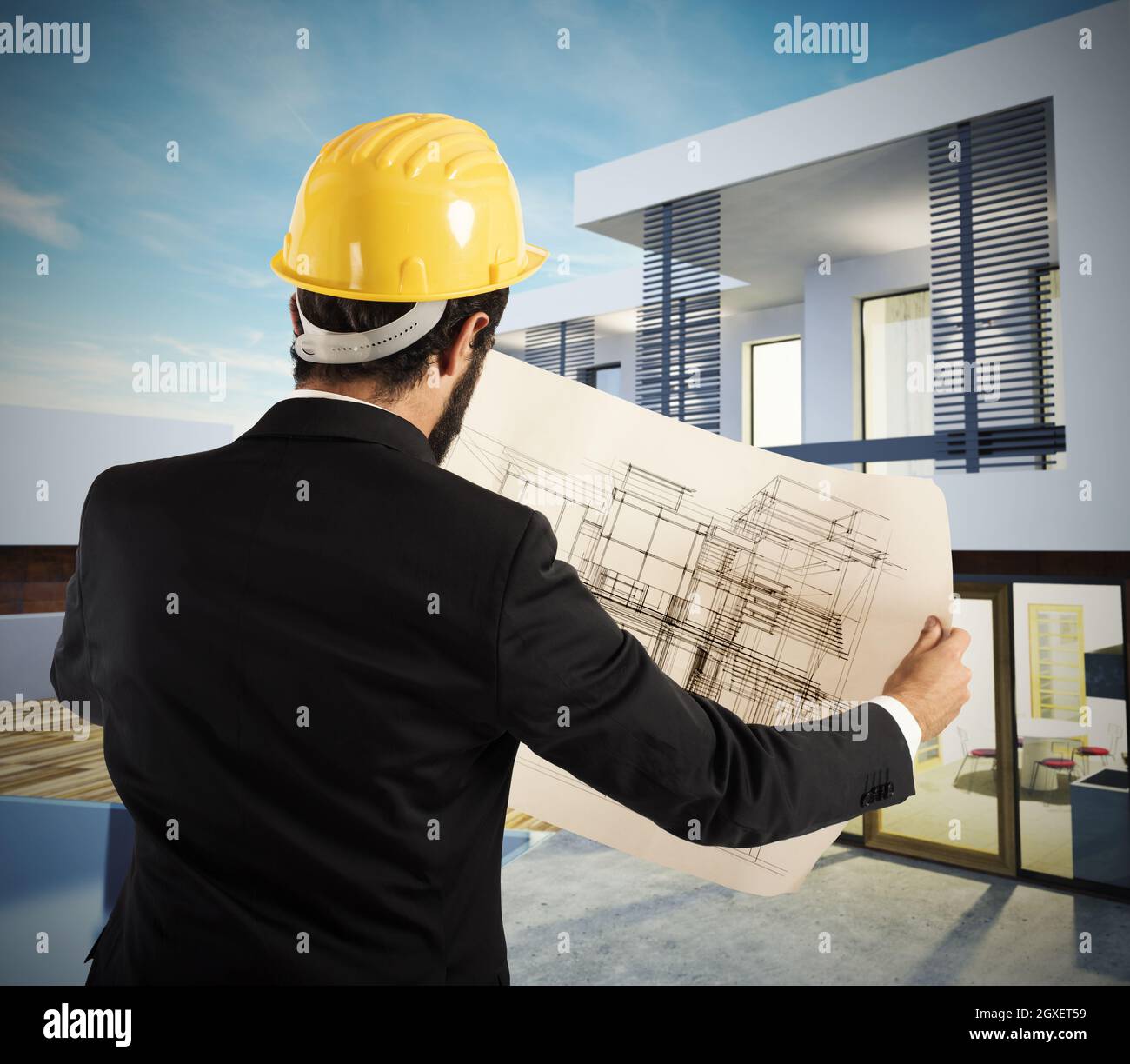 Worker builder designer architect analyzes hi-res stock photography and ...