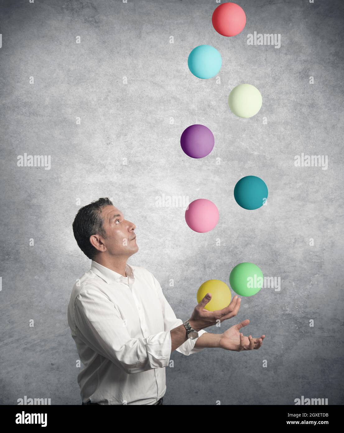 Easy business concept with juggler businessman Stock Photo - Alamy