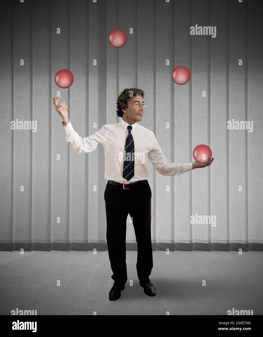 Easy business of an juggler businessman Stock Photo - Alamy