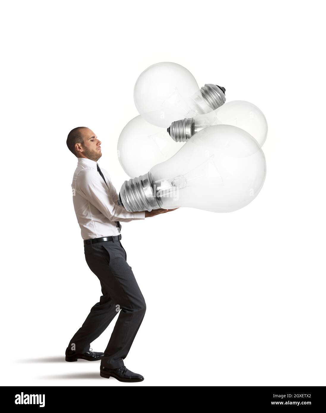 Creative businessman holding a new big idea Stock Photo - Alamy