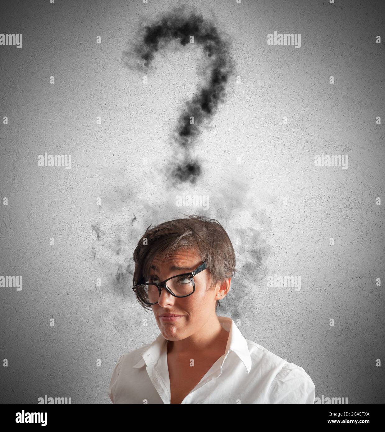 Concept of stressed businessman with question mark Stock Photo - Alamy