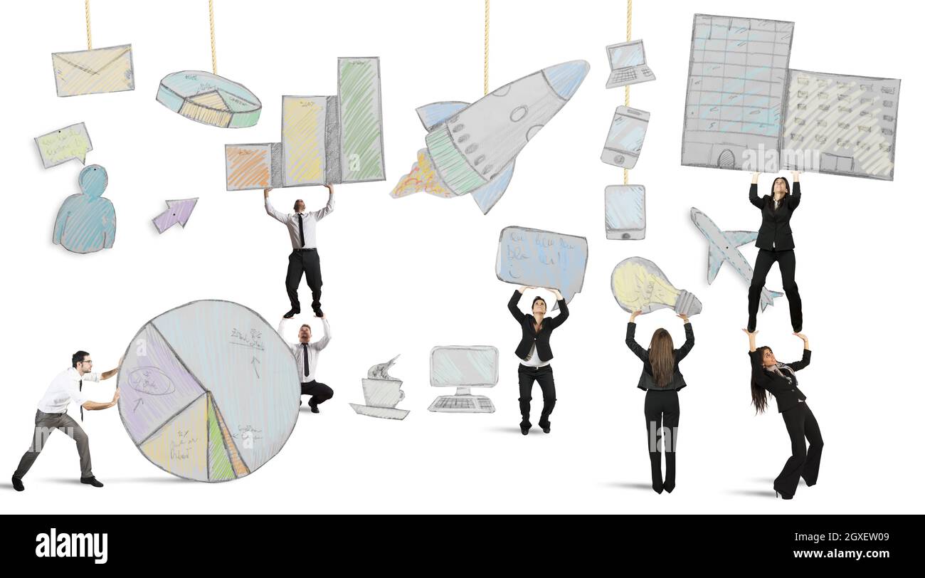Teamwork builds a new creative business project Stock Photo - Alamy