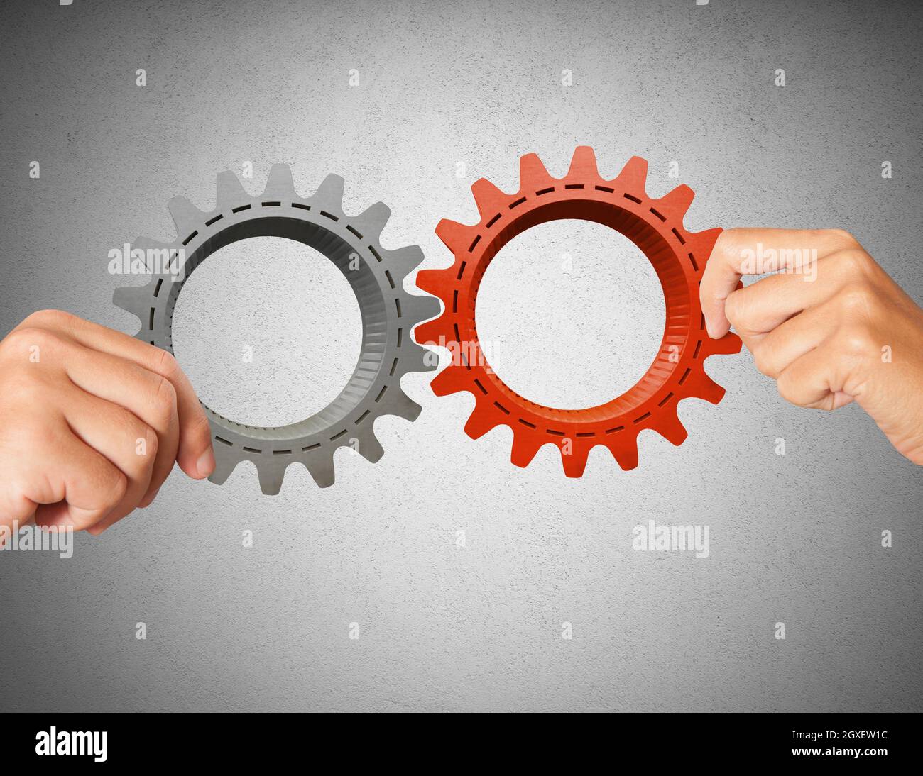 Businessman builds a business system with gear Stock Photo - Alamy