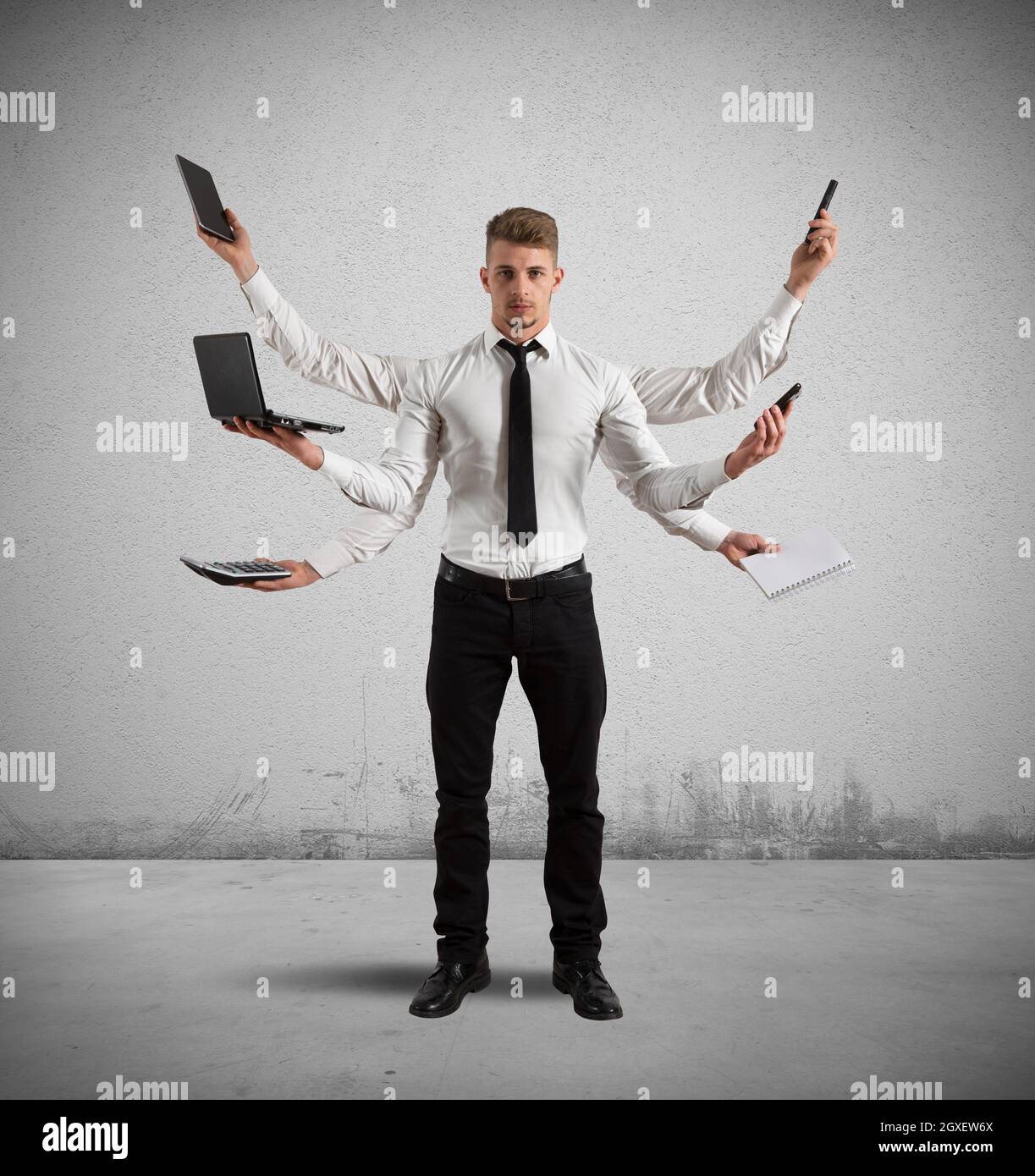 Concept of multitasking with busy businessman at work Stock Photo - Alamy