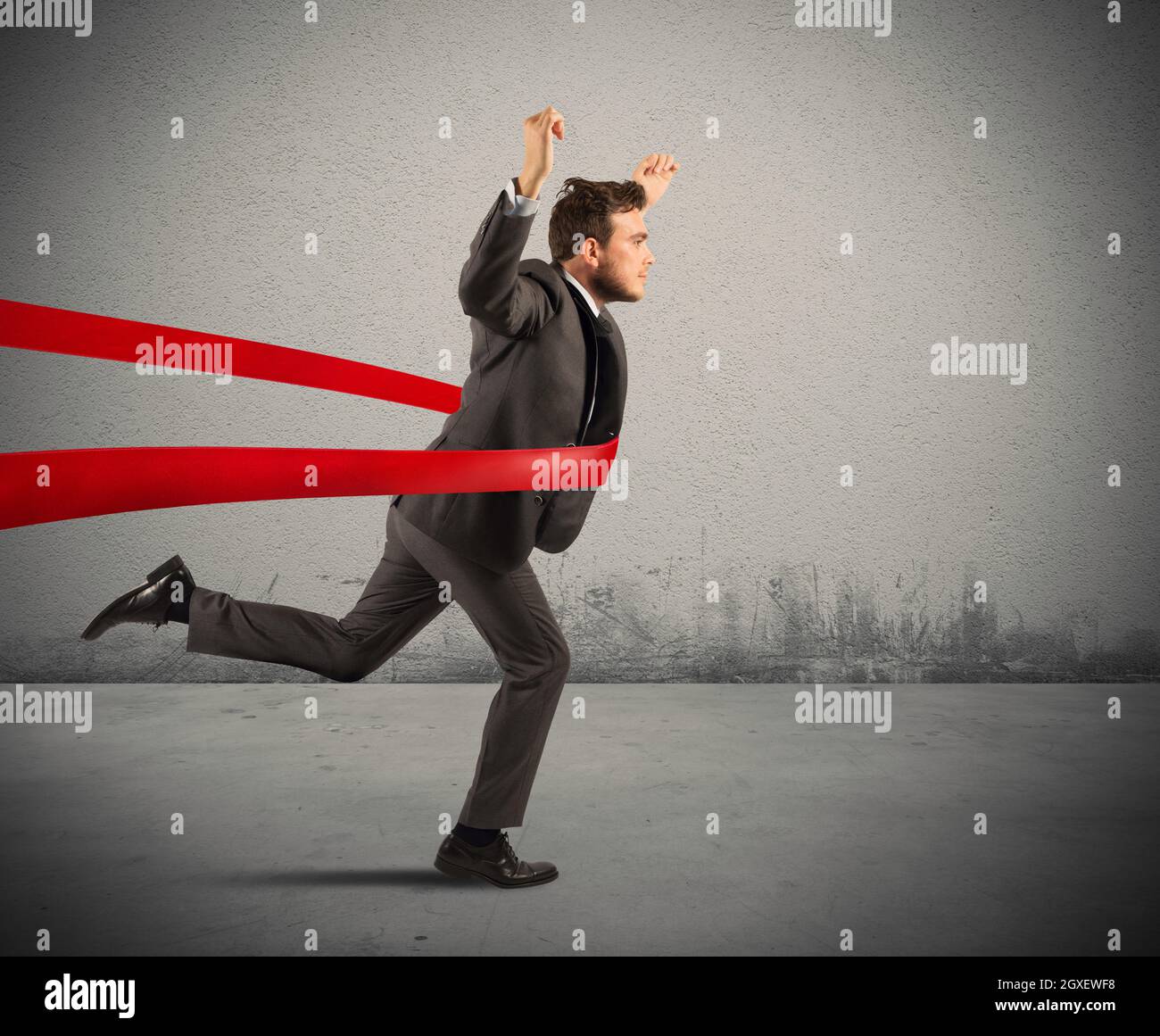 Concept of successful businessman in a finishing line Stock Photo - Alamy