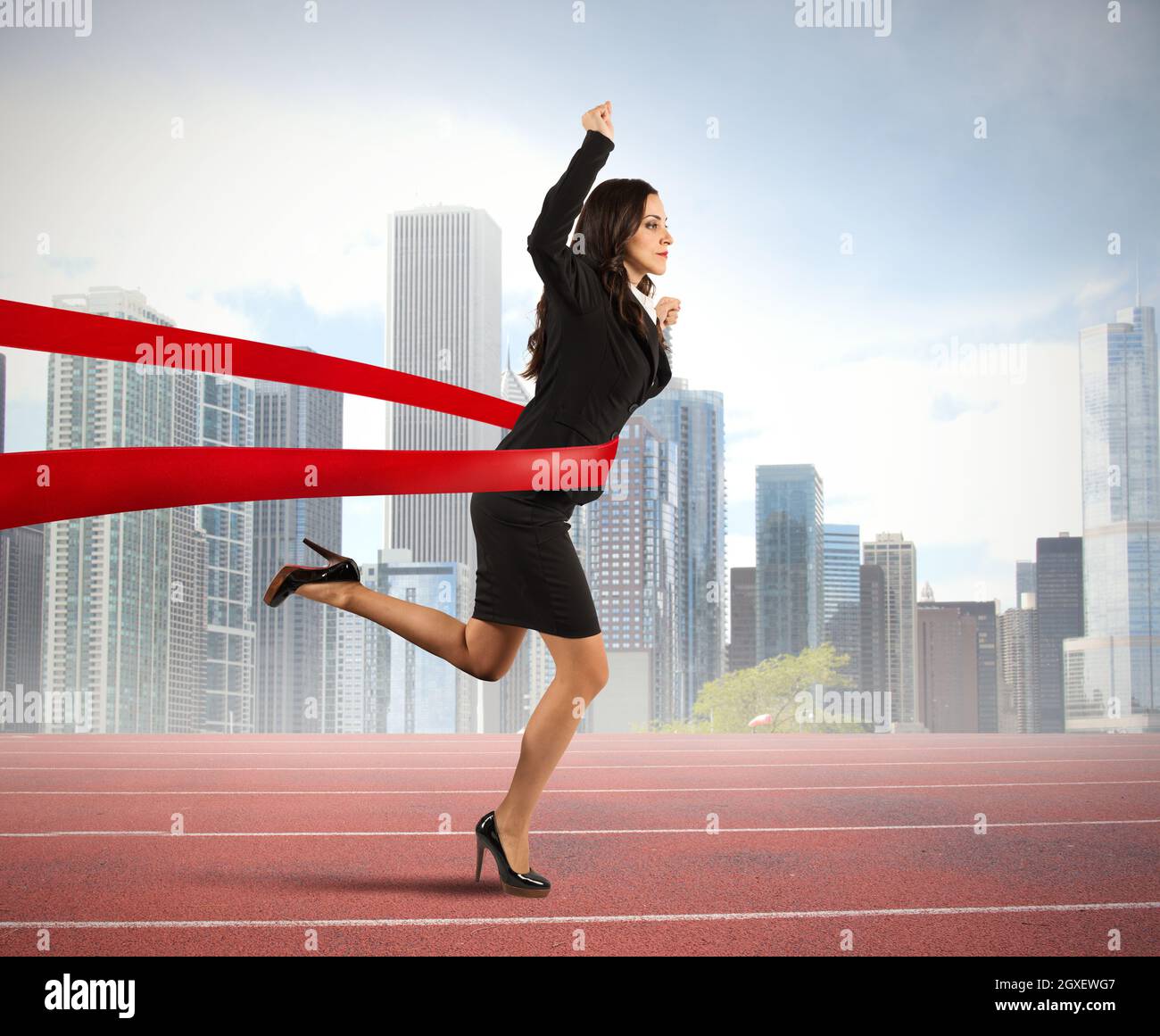 Concept of winner businesswoman in a finish line Stock Photo - Alamy