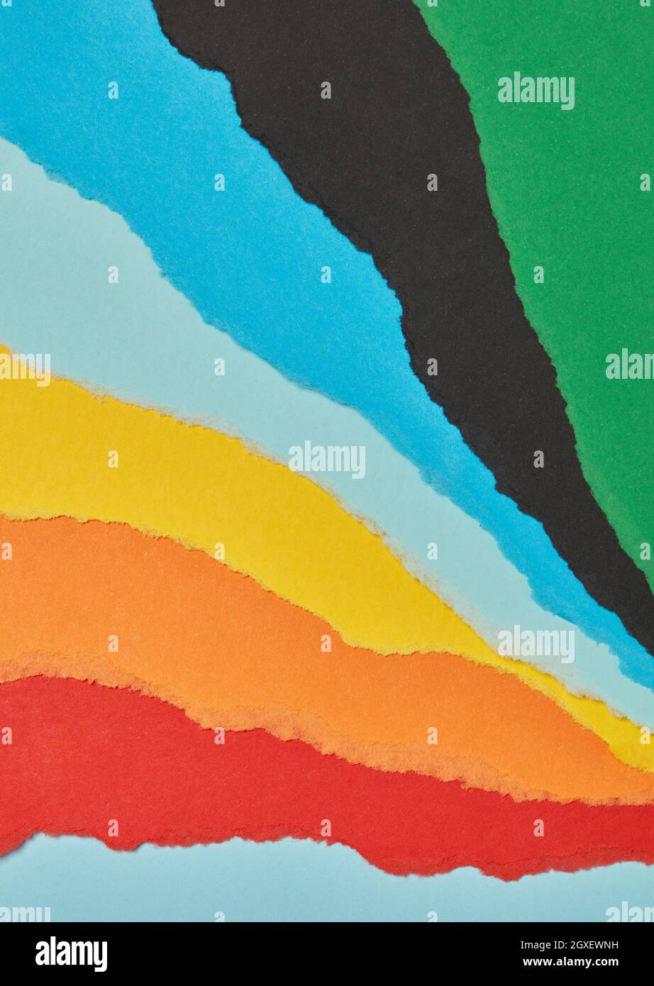 Multi-colored torn paper background Stock Photo - Alamy
