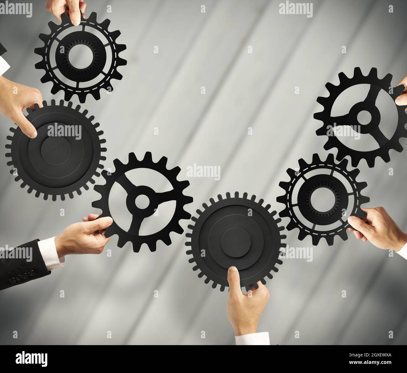 Teamwork and integration concept with connection of gear Stock Photo ...