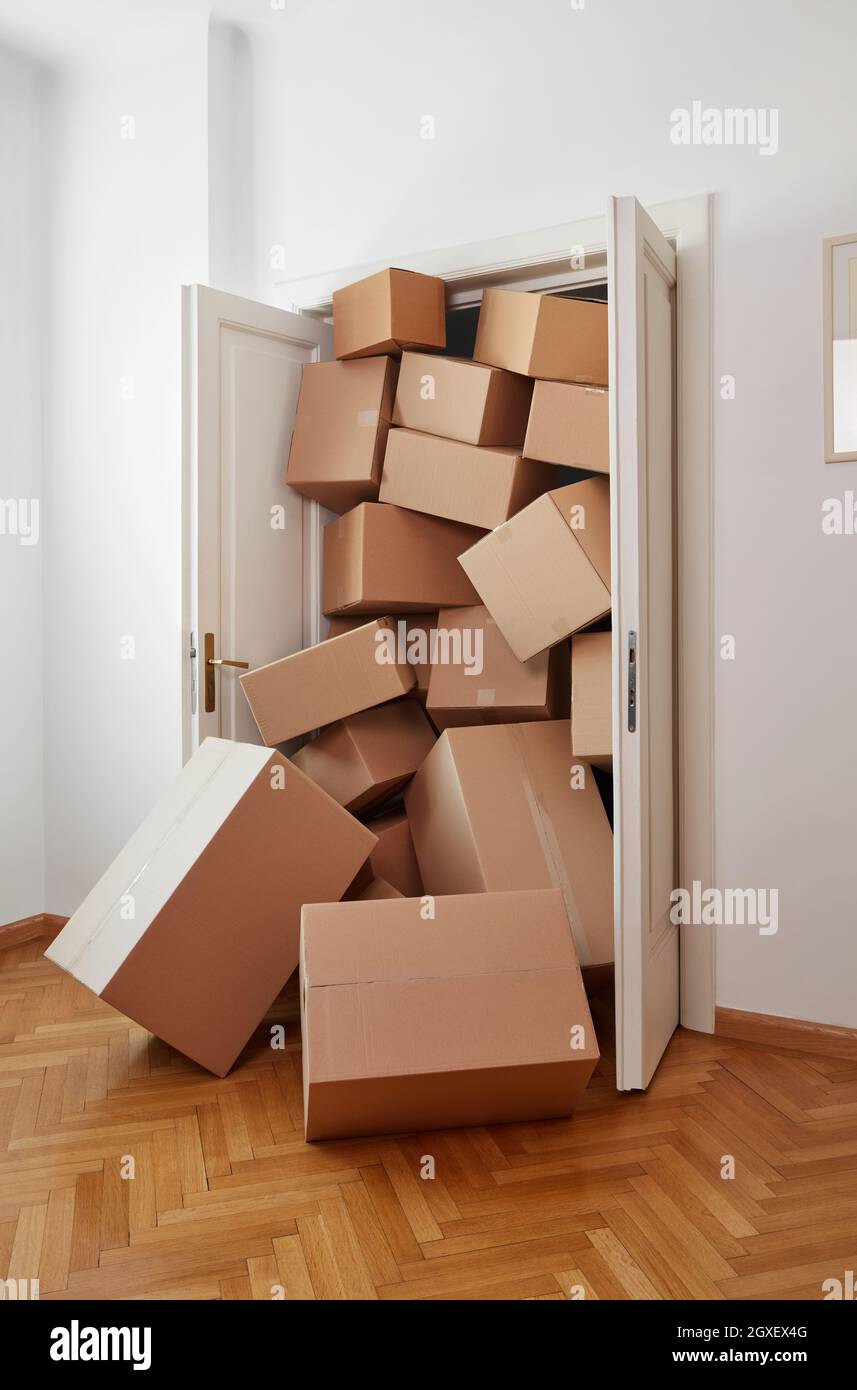 Entrance full with cardboard boxes Stock Photo - Alamy