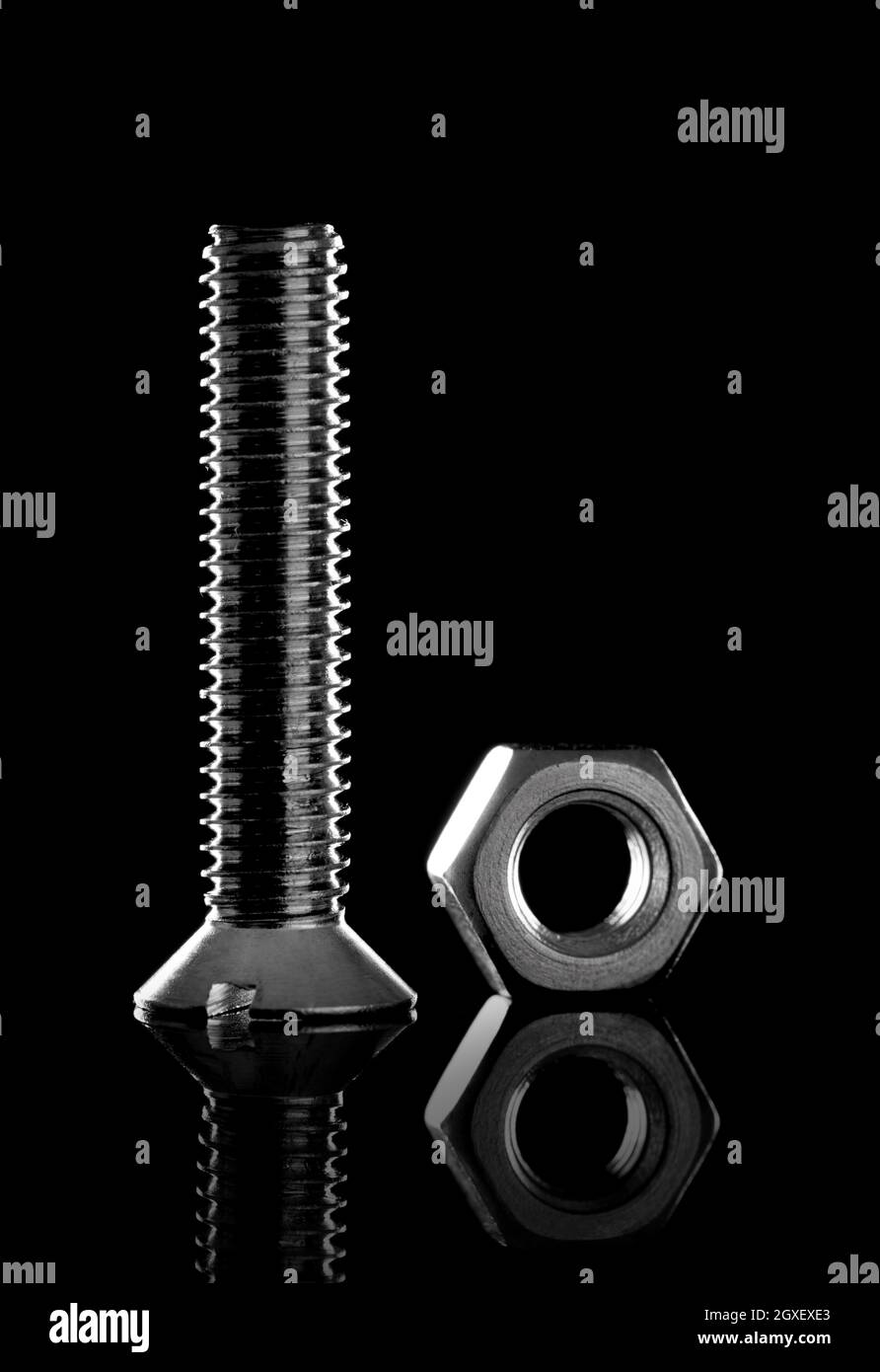 Set of chrome screw and bolt on black background Stock Photo - Alamy