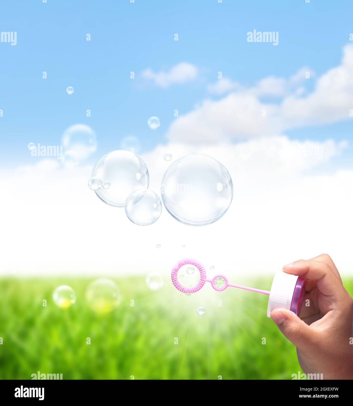 Children that blowing soap ball Stock Photo - Alamy