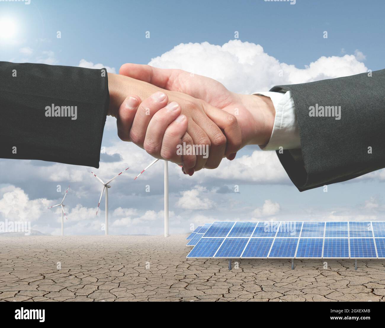 New renewable energy project with handhsake Stock Photo - Alamy