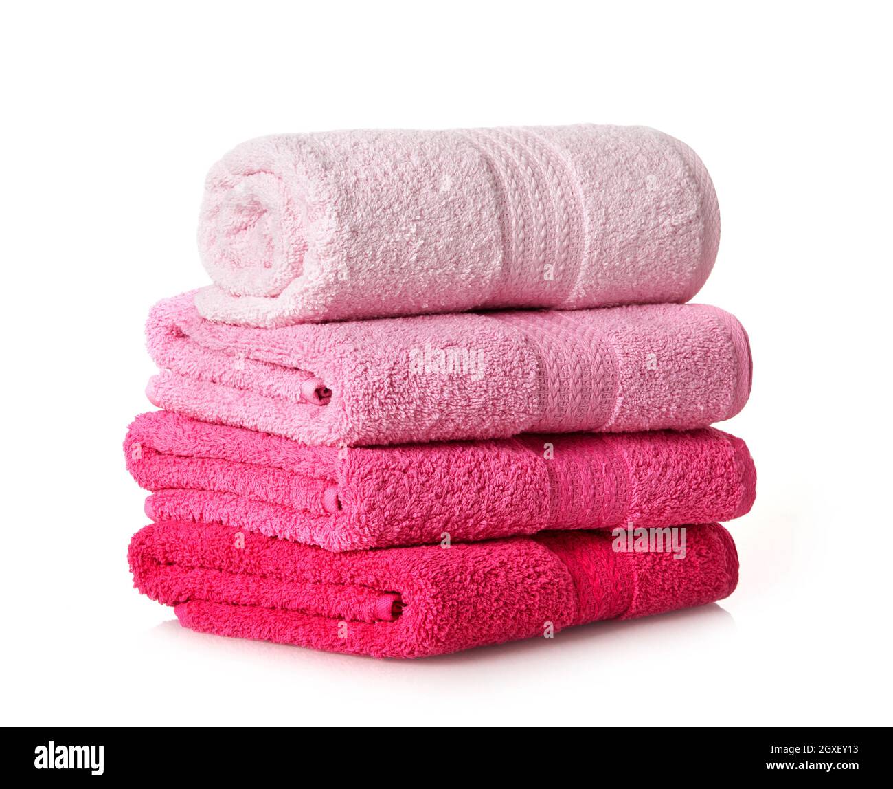 Folded stack of towels on white background Stock Photo - Alamy