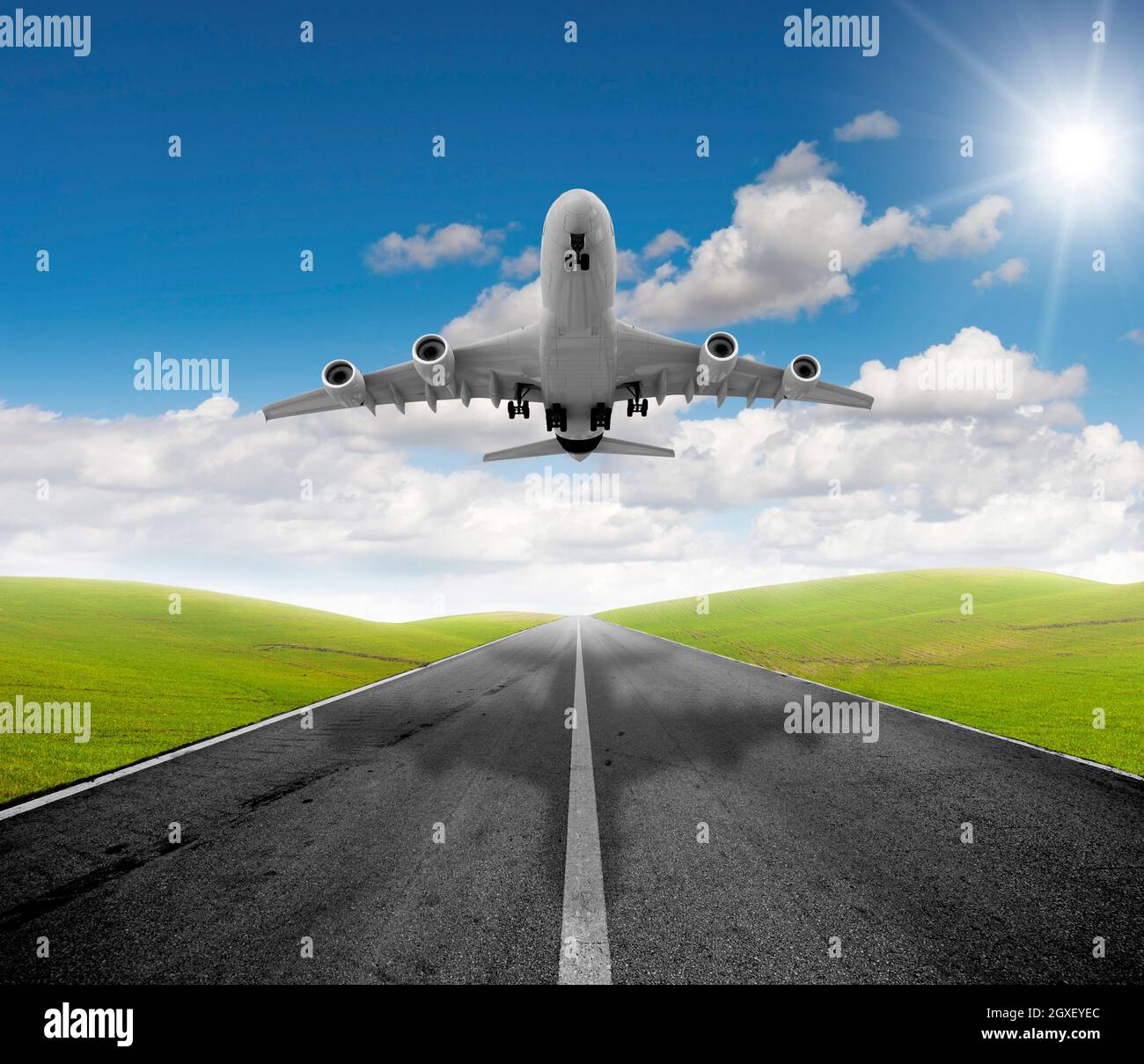 Airplane ready to fly in a green airport Stock Photo - Alamy