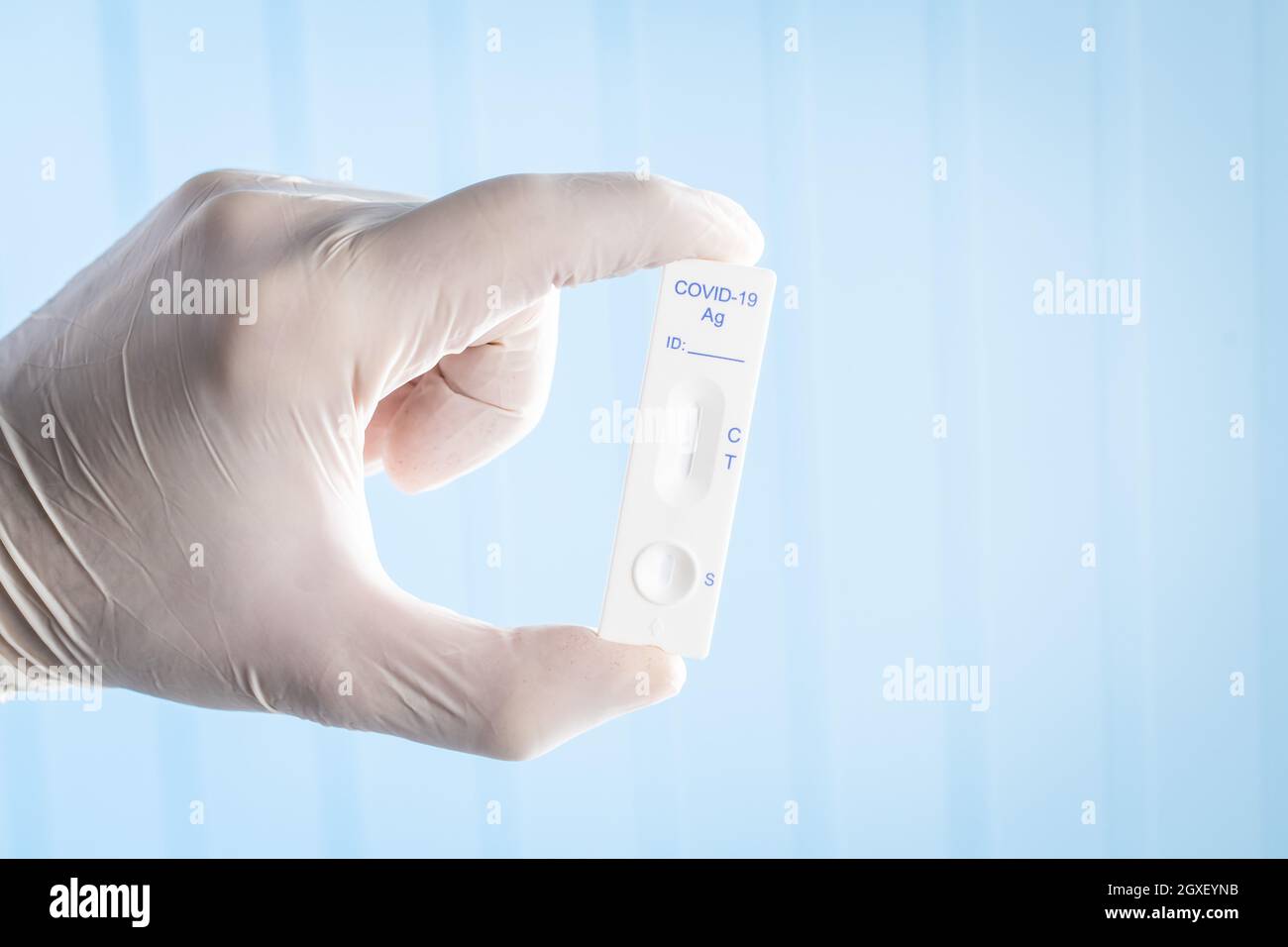 Covid-19 rapid antigen test. Rapid antibodies test kit in hand with ...